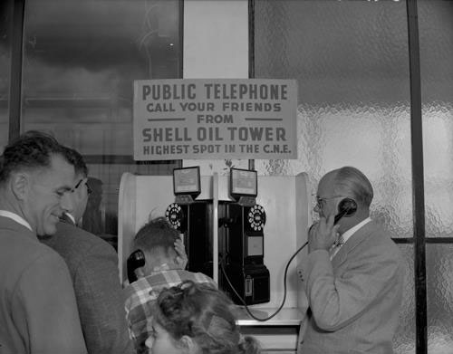 CNE Guests Lining up to use the Public Telephone, 1955 – CNE Heritage